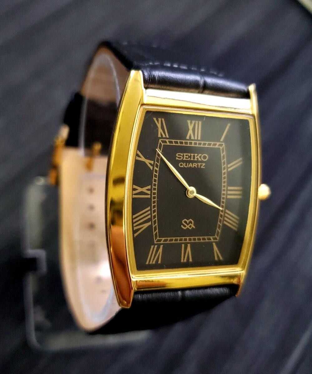 Seiko Vintage Seiko Tank Men's Tank Barrel Gold Black… - Gem